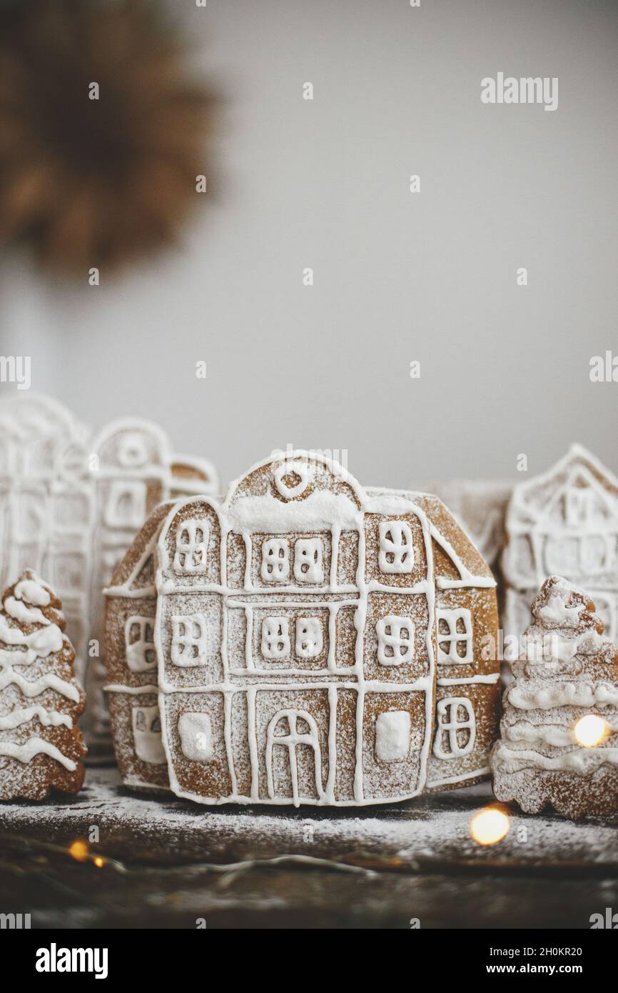 Merry Christmas ! Christmas gingerbread houses and trees in snow on ...