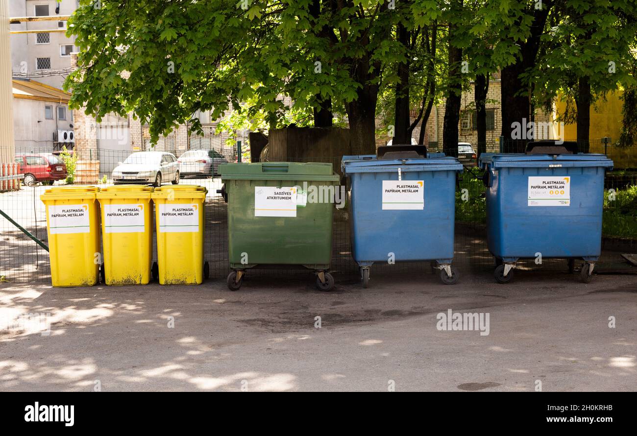 Urban recycling yard with multiple types of bins Stock Photo - Alamy