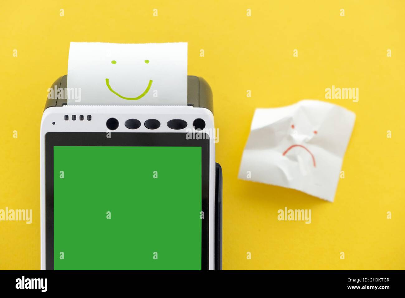 POS terminal with touchscreen green display with printed reciept with a ...