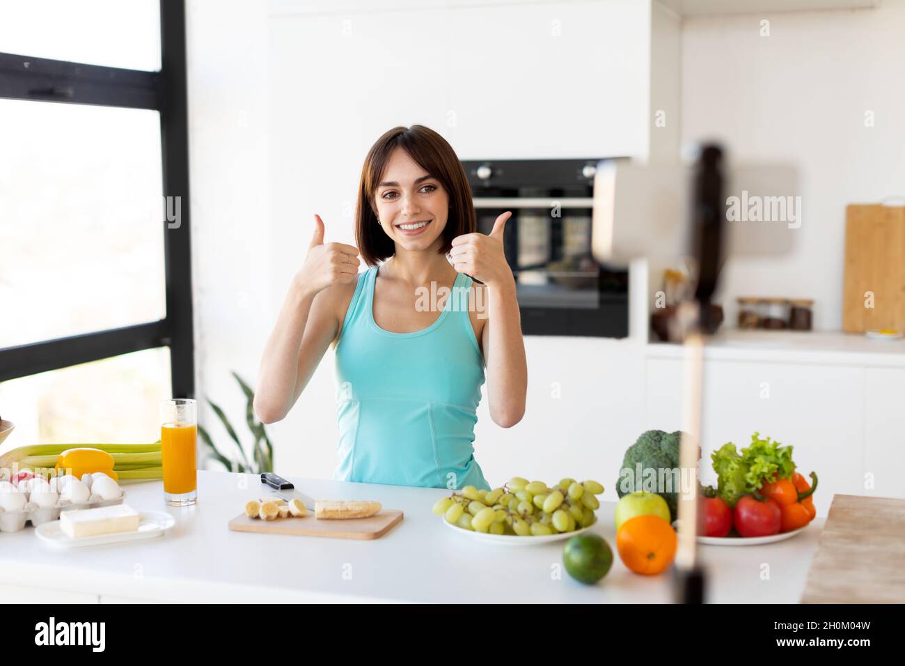 Healthy food blogger filming new culinary video blog, giving dieting ...
