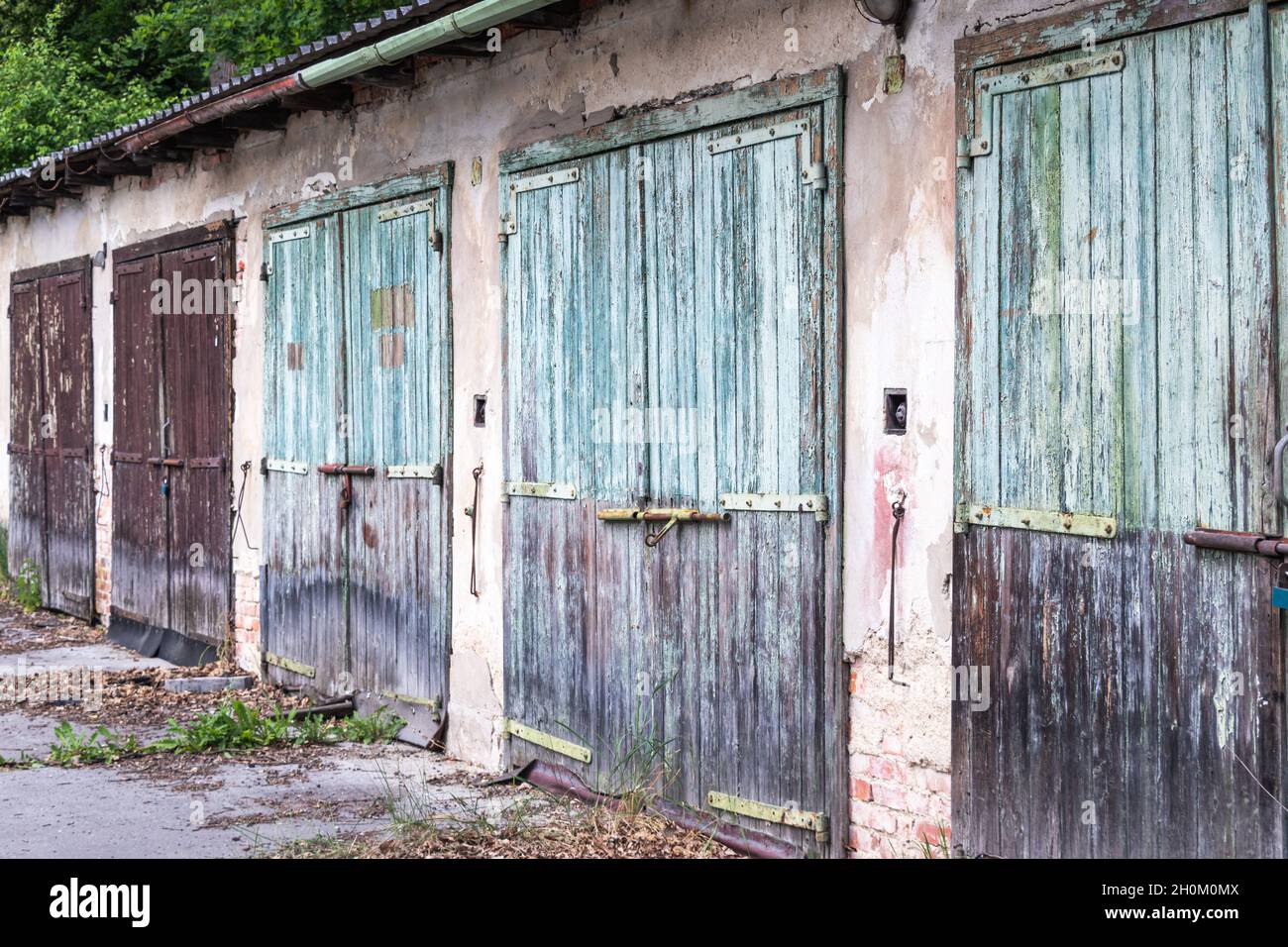old garages with wooden doors Stock Photo - Alamy