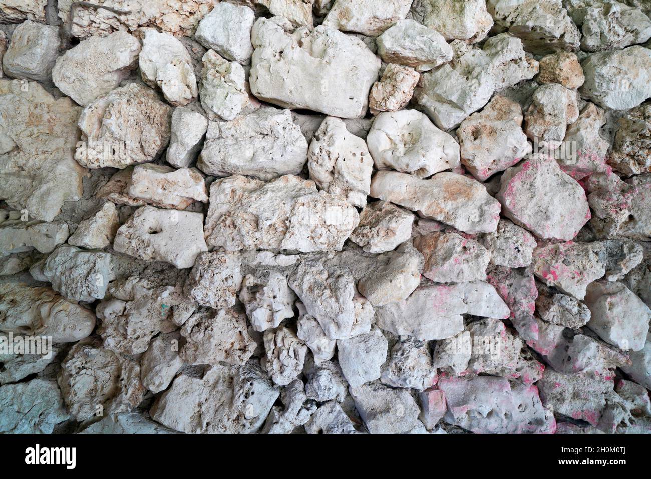 Structure of a stone made of natural mineral material as a background ...