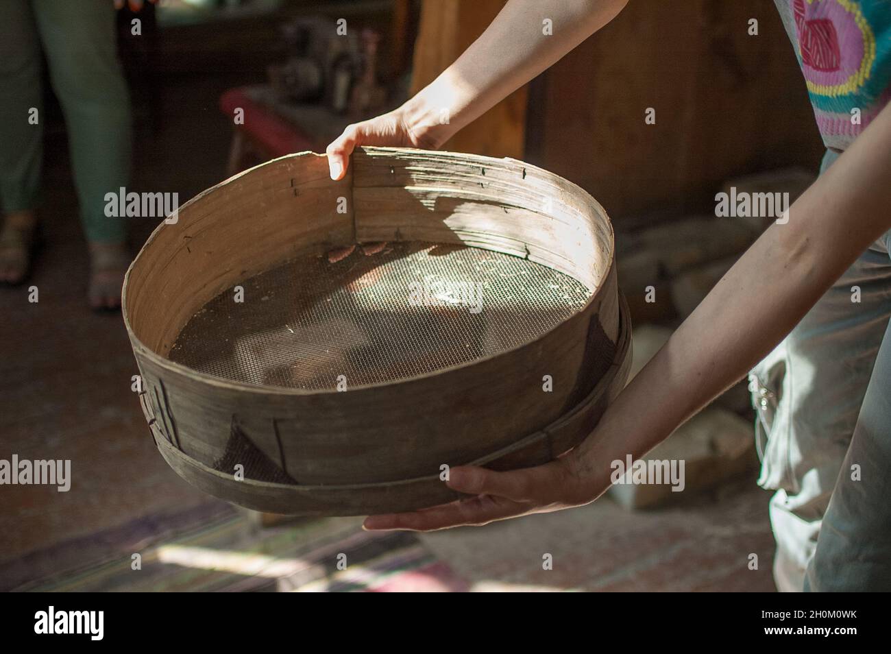 Old sieves, tool for bakery from the past for flour sifting in female ...