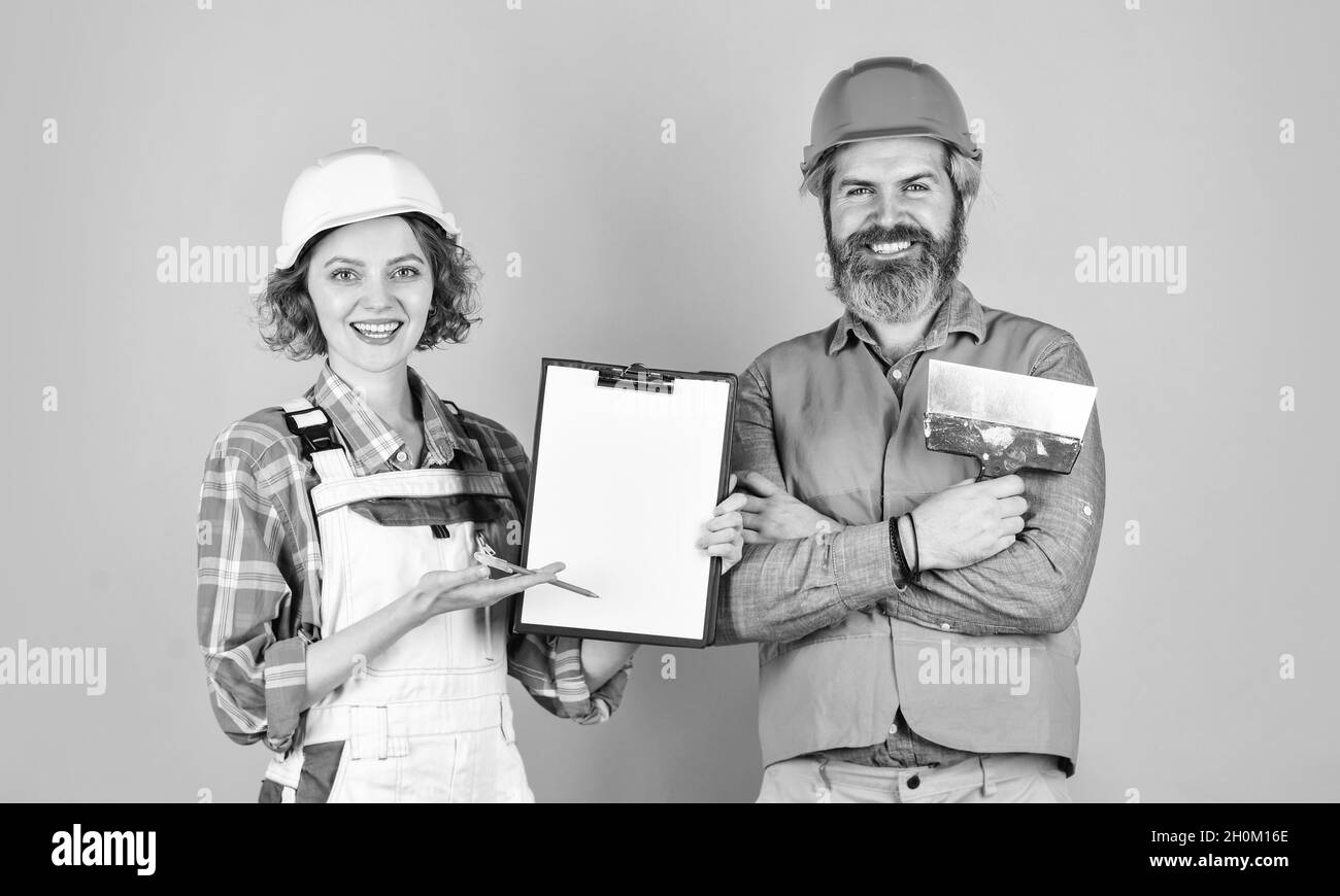 confident electrical and technician. engineers couple working together ...