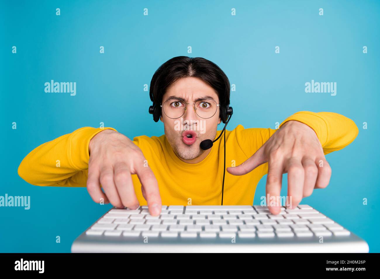 Photo of millennial cool brunet guy type wear yellow shirt isolated on ...