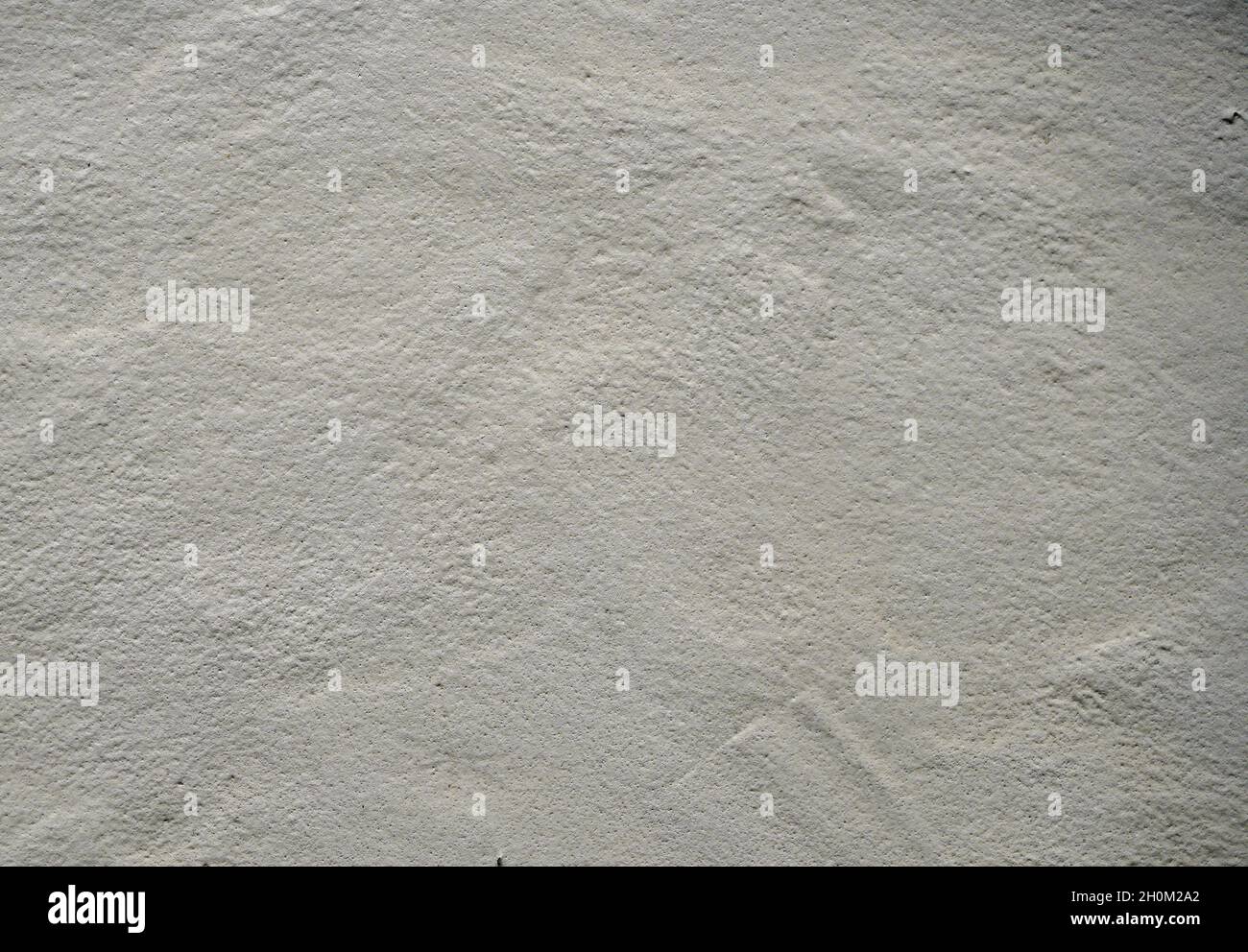 Structure of a stone made of natural mineral material as a background ...