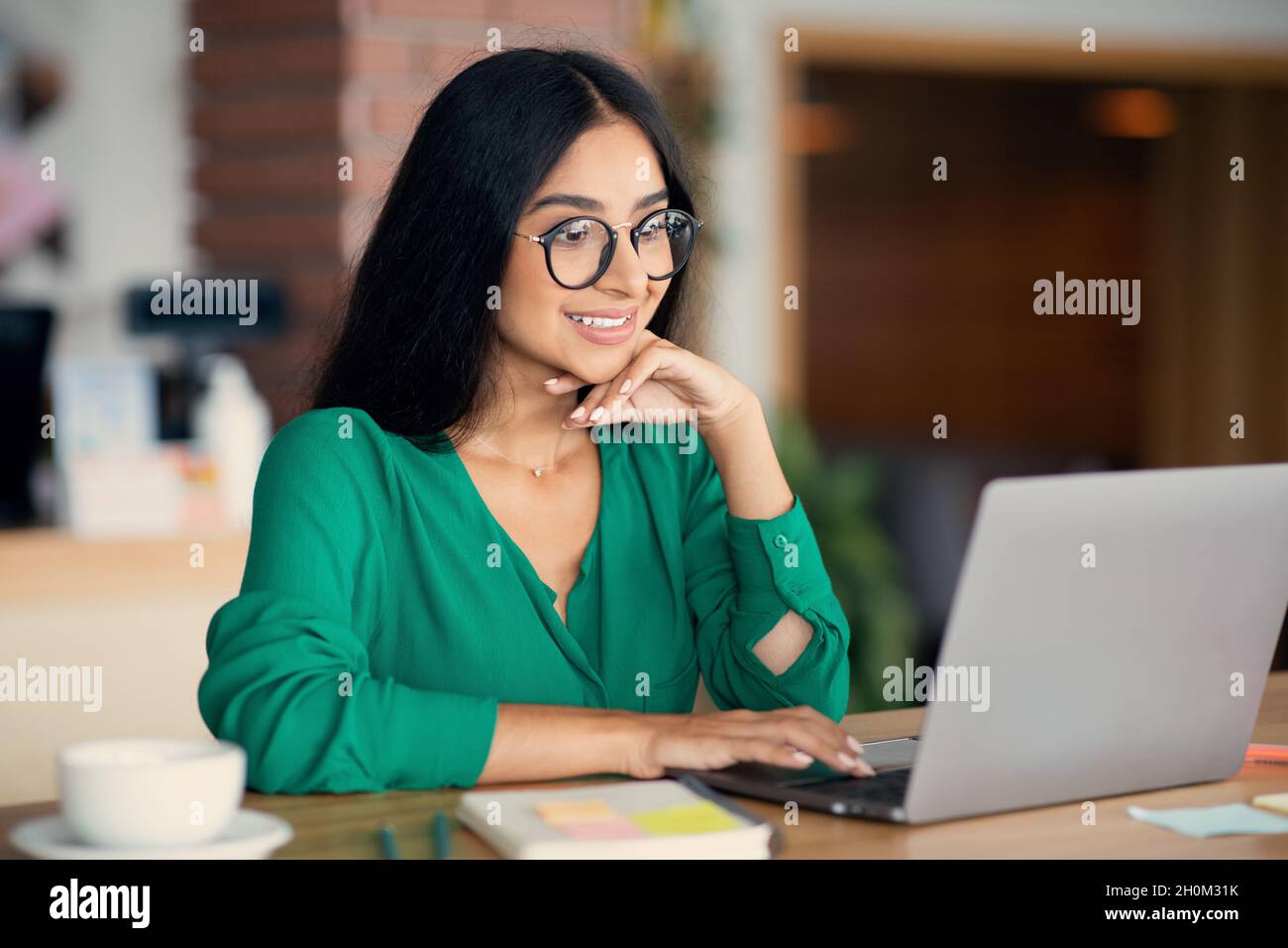 Indian woman studying hi-res stock photography and images - Alamy