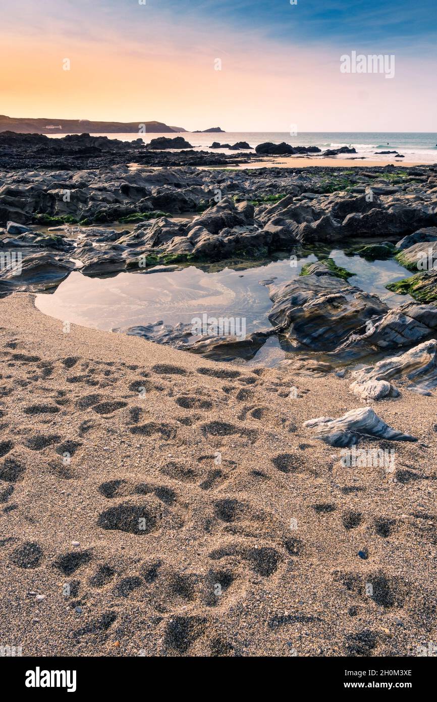 Rocks and rock pools at low tide at the secluded Little Fistral in ...