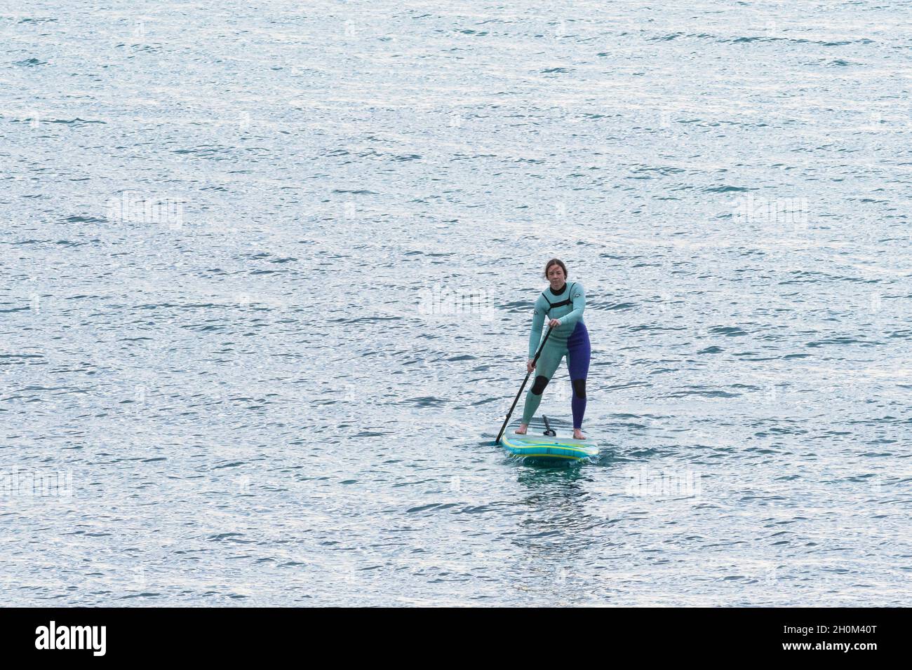Stand up paddling on the sea hi-res stock photography and images - Alamy
