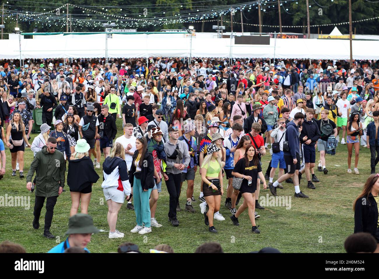 Large crowds of young people head towards the music stages at the Leeds ...