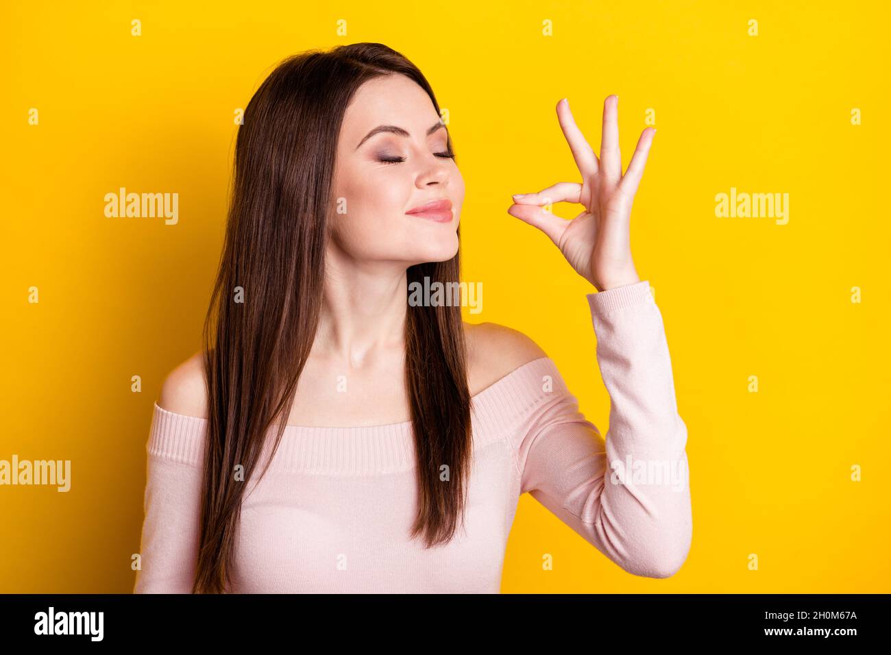 Photo of young cheerful positive lovely girl showing chef sign dreaming ...