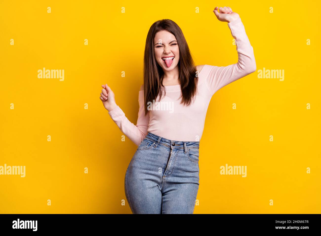 Photo of optimistic brunette lady dance tongue out wear pink shirt ...