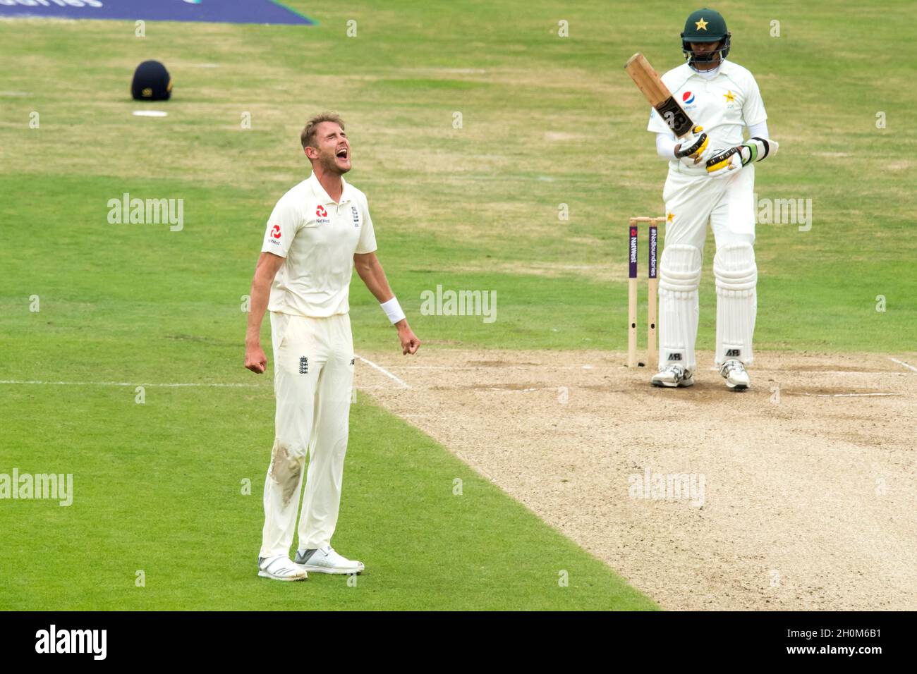 England’s Stuart Broad celebrates as England captain Joe Root takes the ...