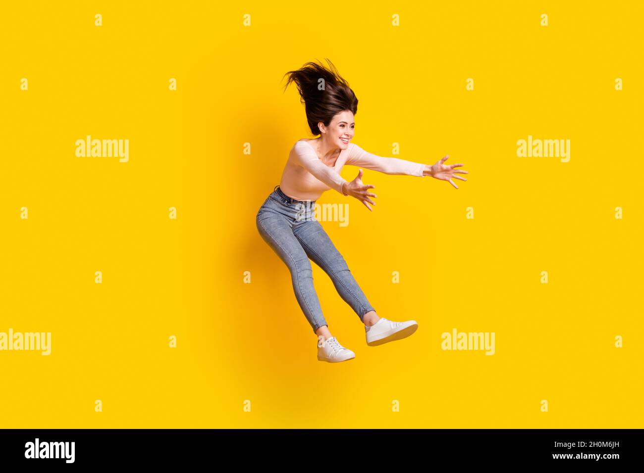 Full size photo of young lovely crazy smiling excited girl jumping ...