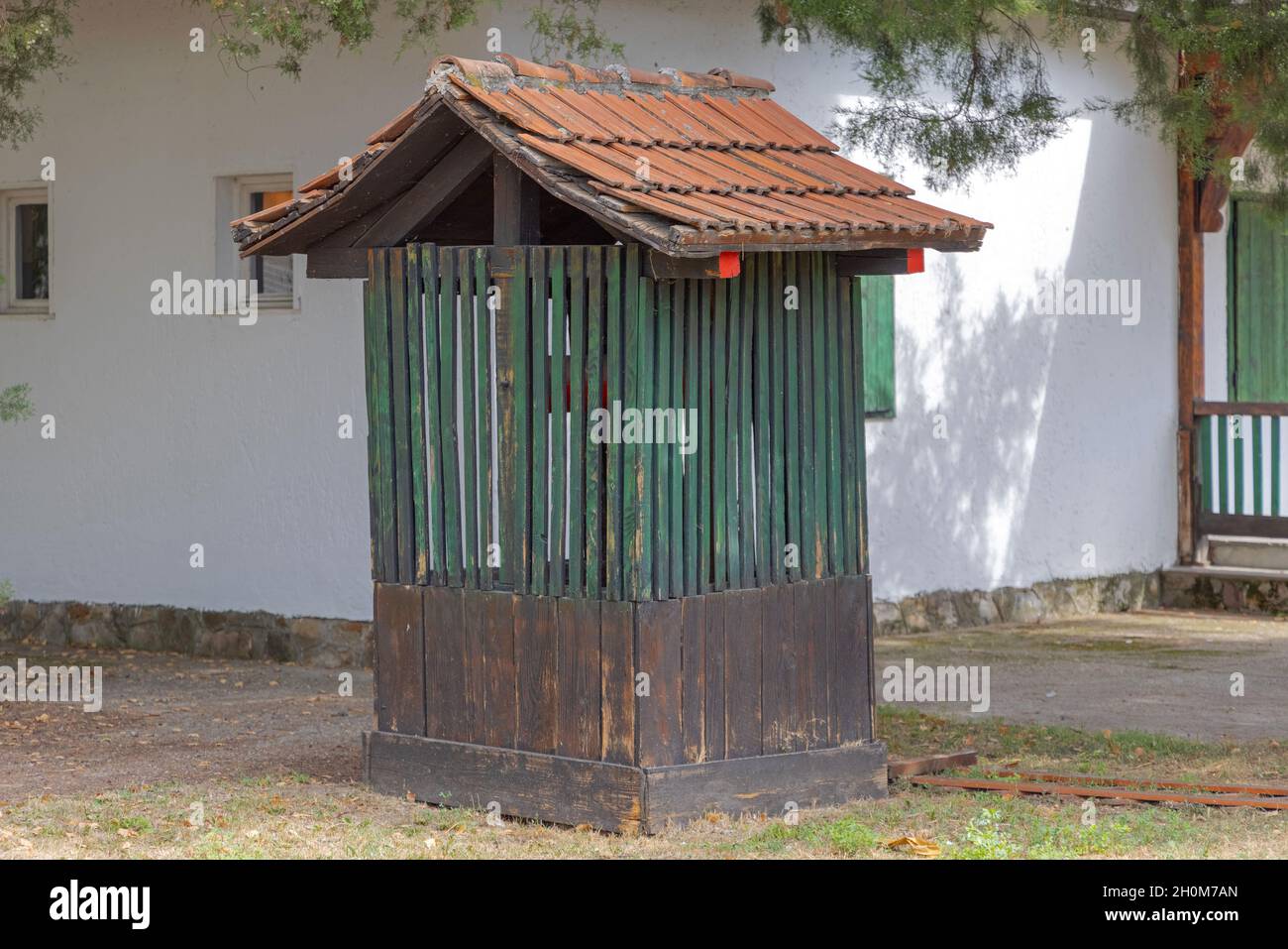 Old Water Well Wooden Enclosure Structure in Village Stock Photo - Alamy