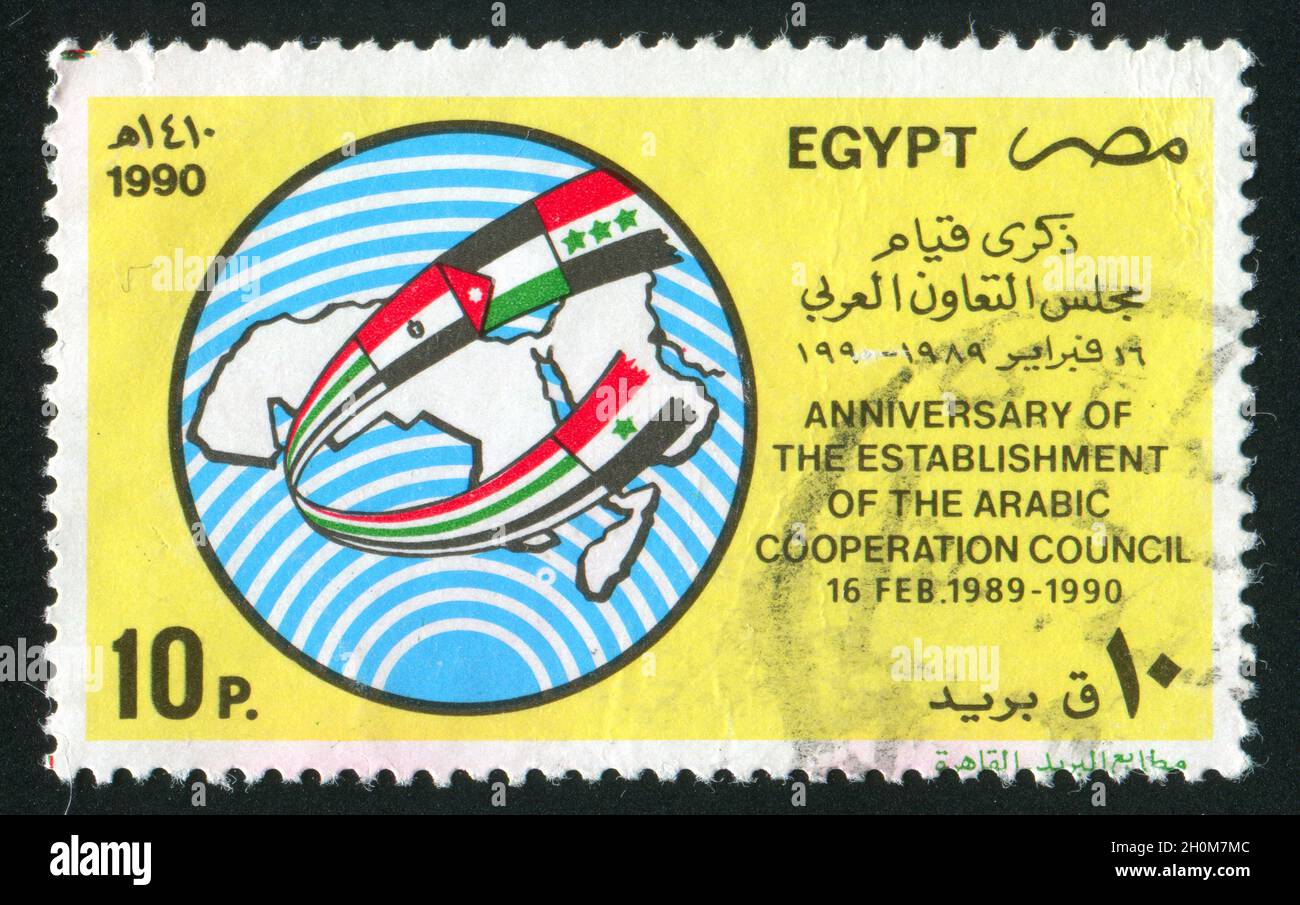 EGYPT - CIRCA 1990: stamp printed by Egypt, shows Globe, National Flags ...