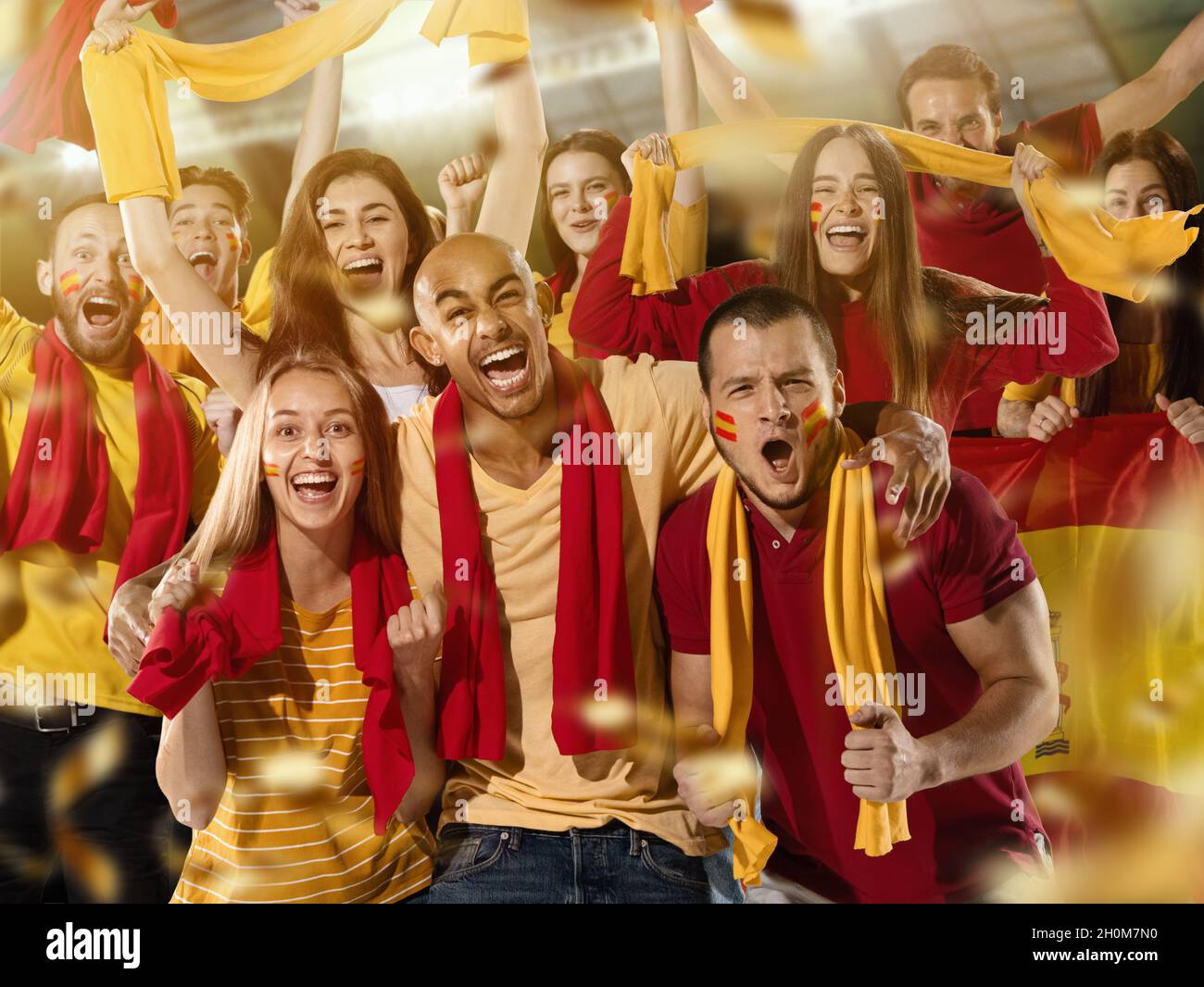 Spanish football, soccer fans cheering their team with yellow red ...