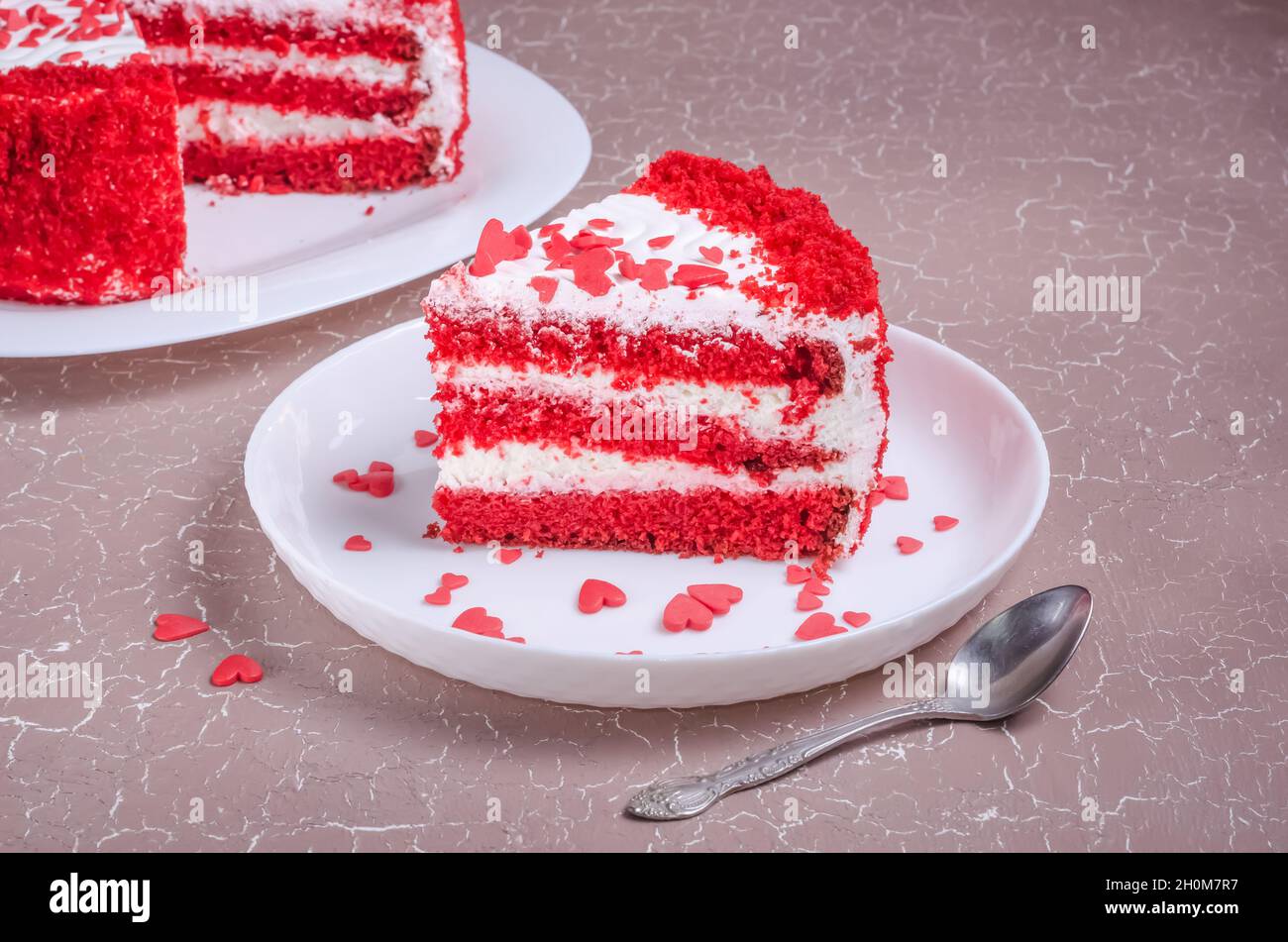 Cutaway red velvet cake, classic three-layer red sponge cake with white ...