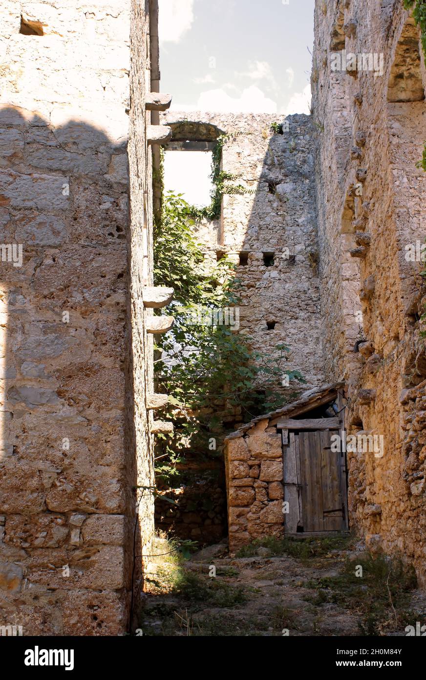 Path going through buildings Stock Photo - Alamy
