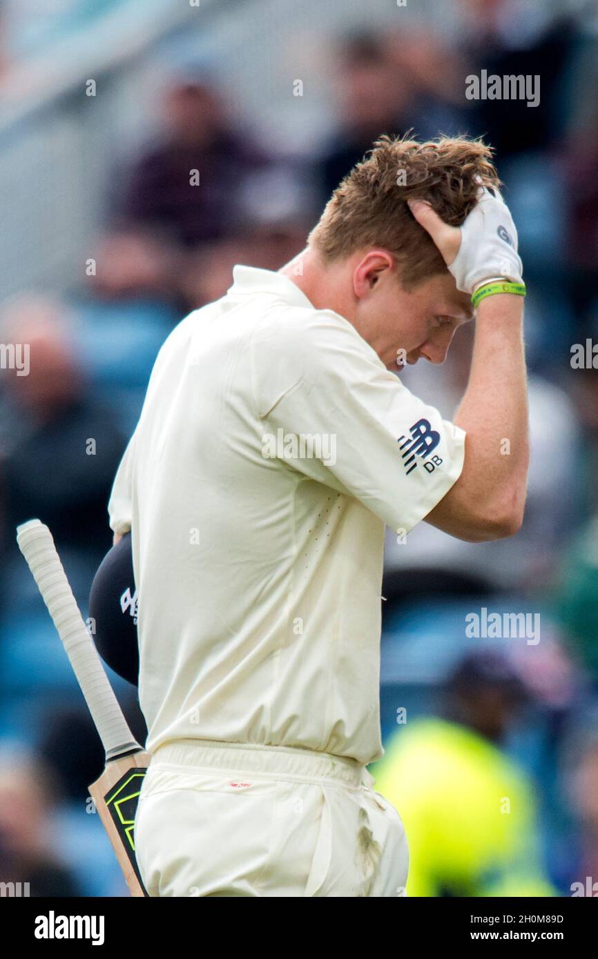 England’s Dominic Bess reacts after being caught behind by Pakistan’s ...