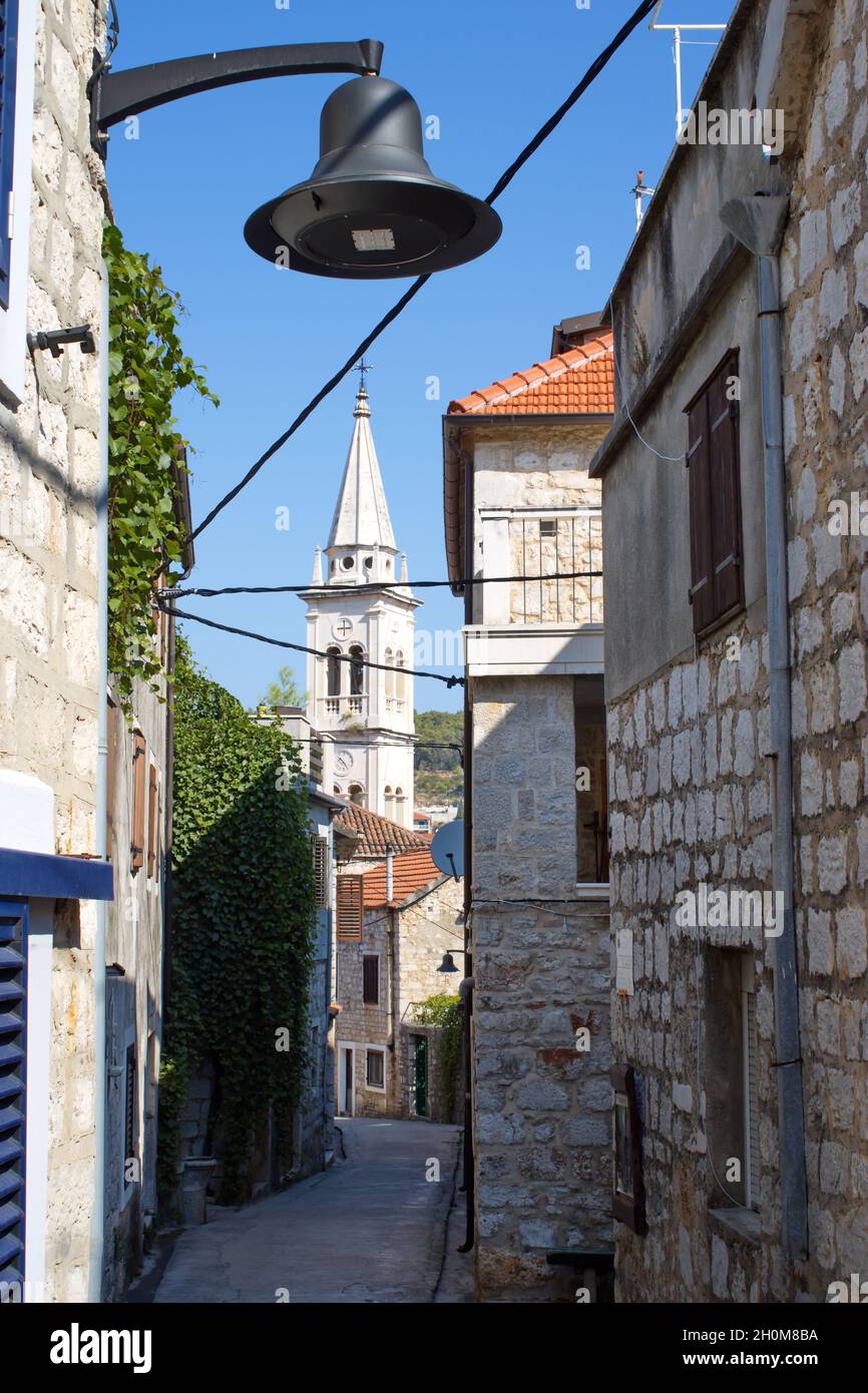 Path going through buildings Stock Photo - Alamy
