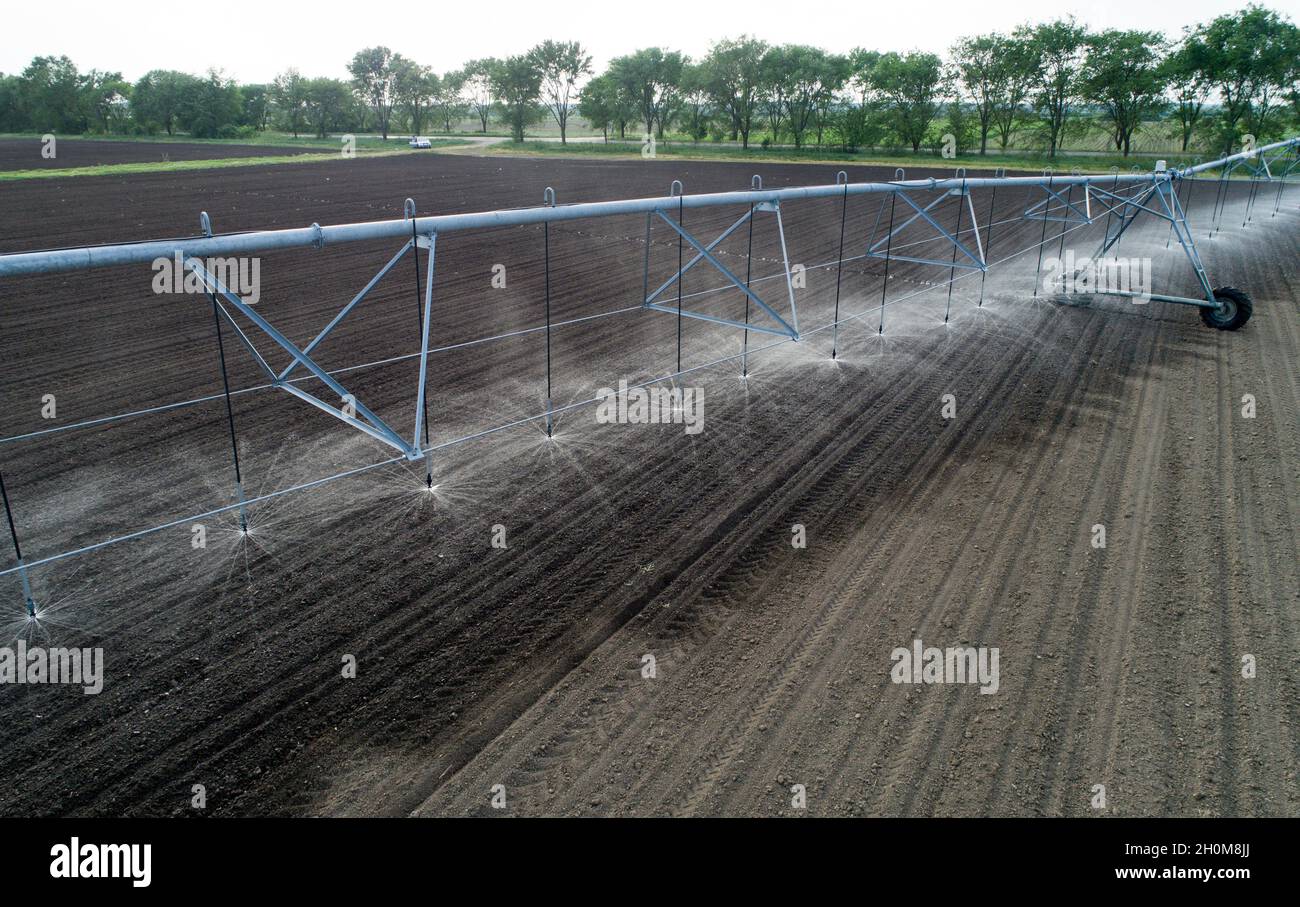 Aerial image of center pivot irrigation system working on round field ...