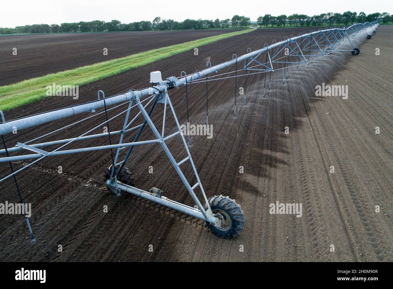 Aerial image of center pivot irrigation system working on round field ...