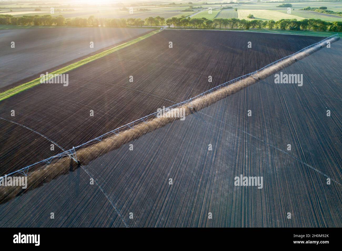 Aerial image of center pivot irrigation system working on round field ...