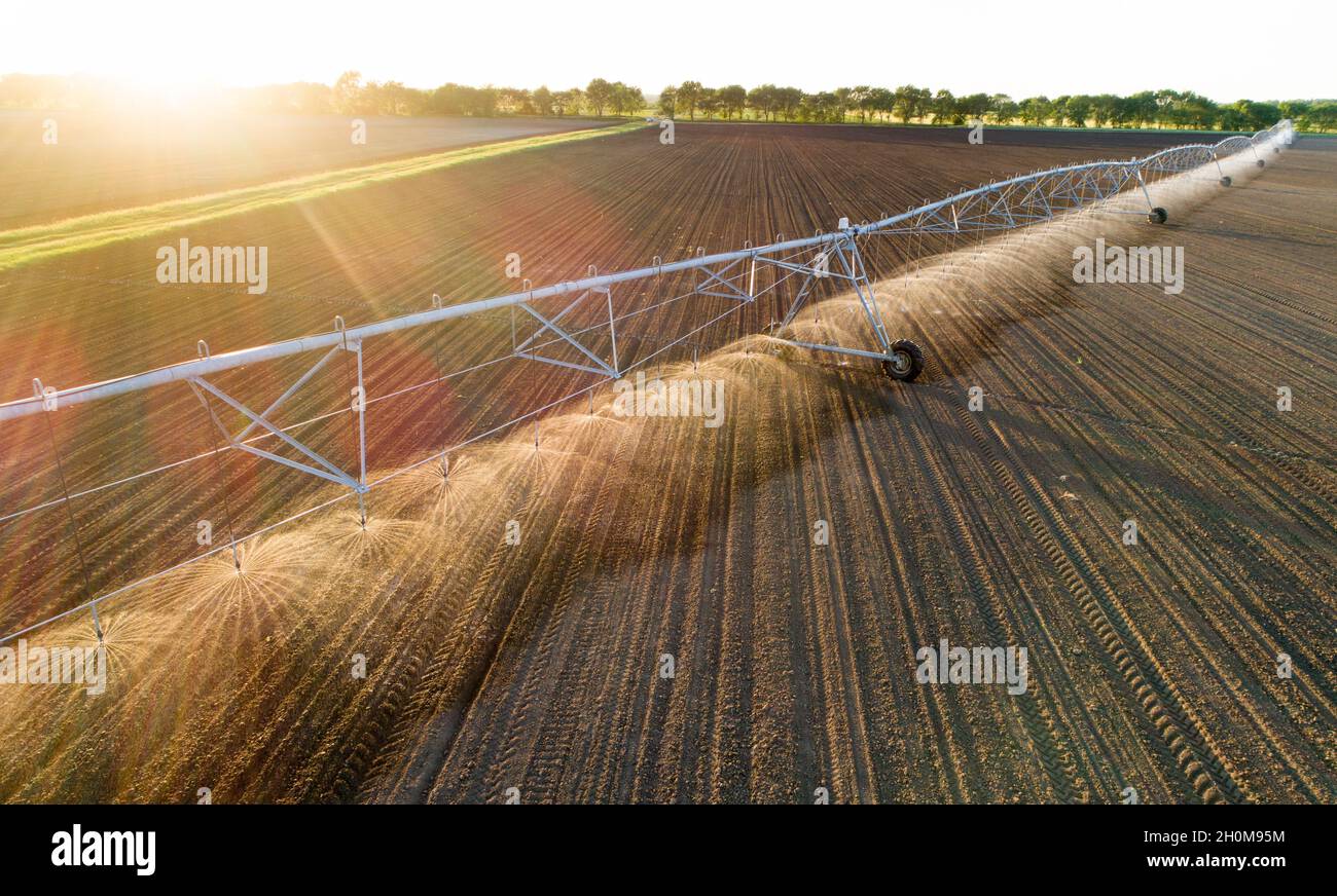 Aerial image of center pivot irrigation system working on round field ...