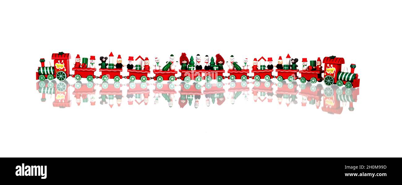 Red Christmas train isolated on a white background Stock Photo - Alamy