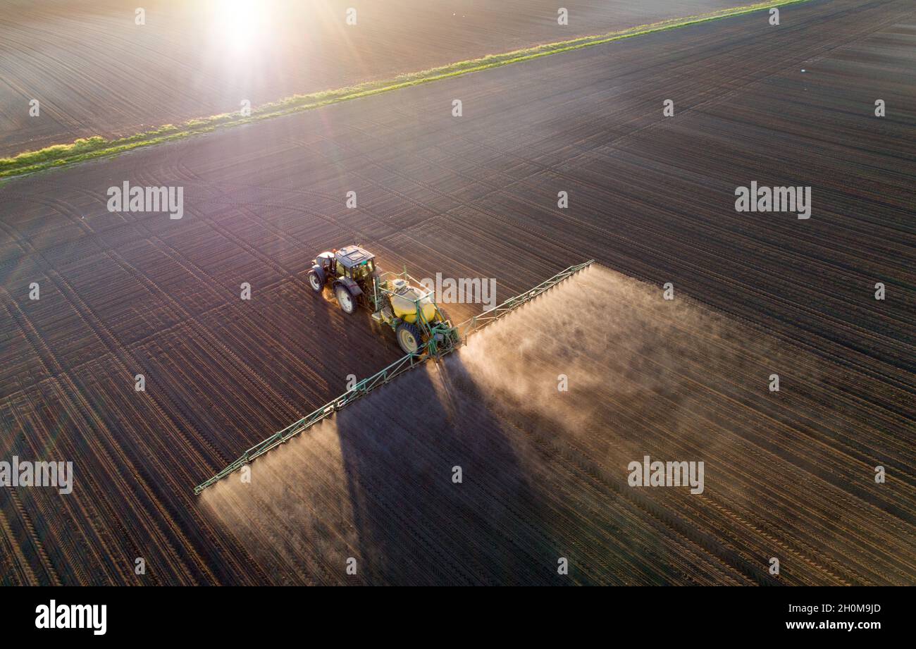 Tractor spraying soil hi-res stock photography and images - Alamy