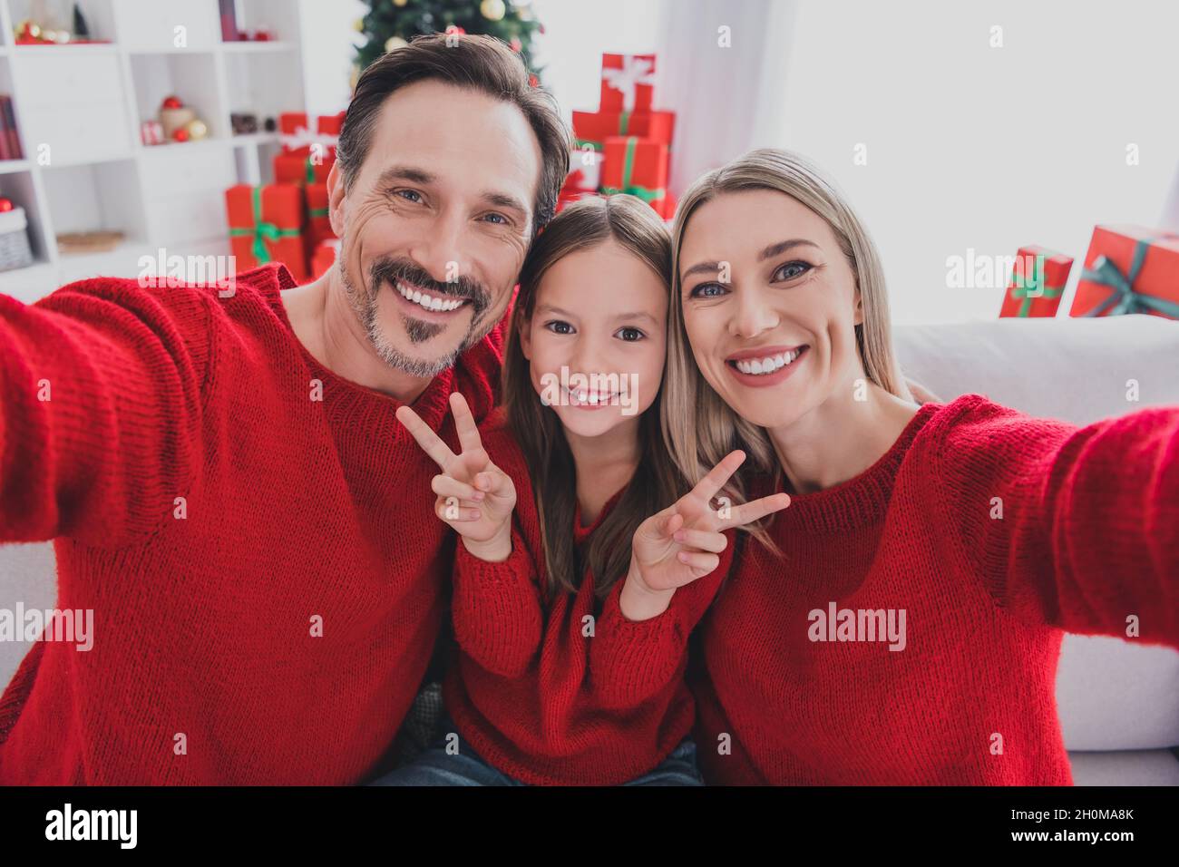 Self-portrait of attractive cheerful funky family wife husband mom dad ...