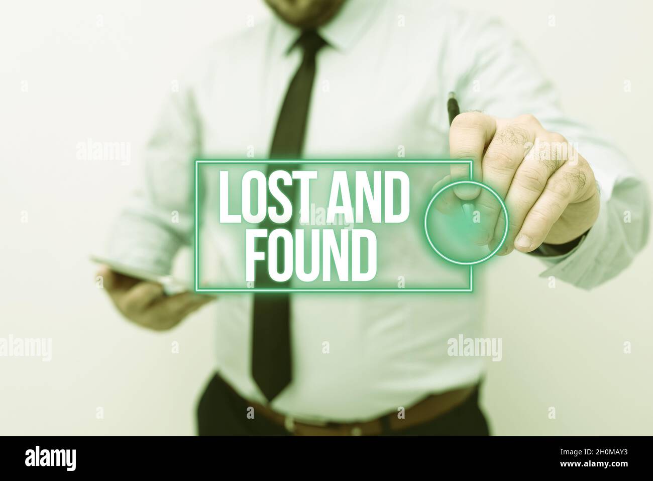 Hand writing sign Lost And Found. Concept meaning a place where lost ...