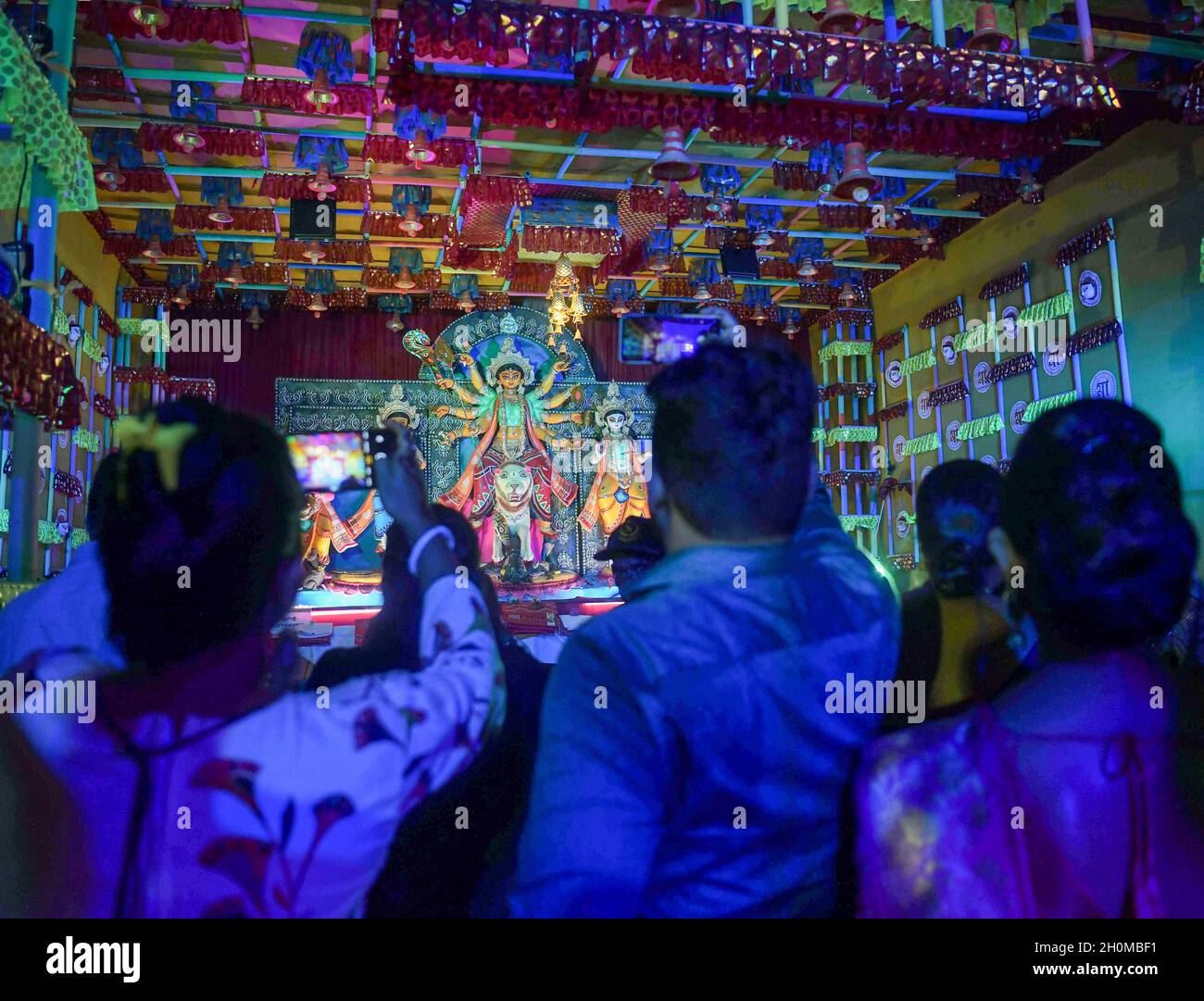 Agartala, Tripura, India. 13-10-2021. People visit a makeshift place of ...