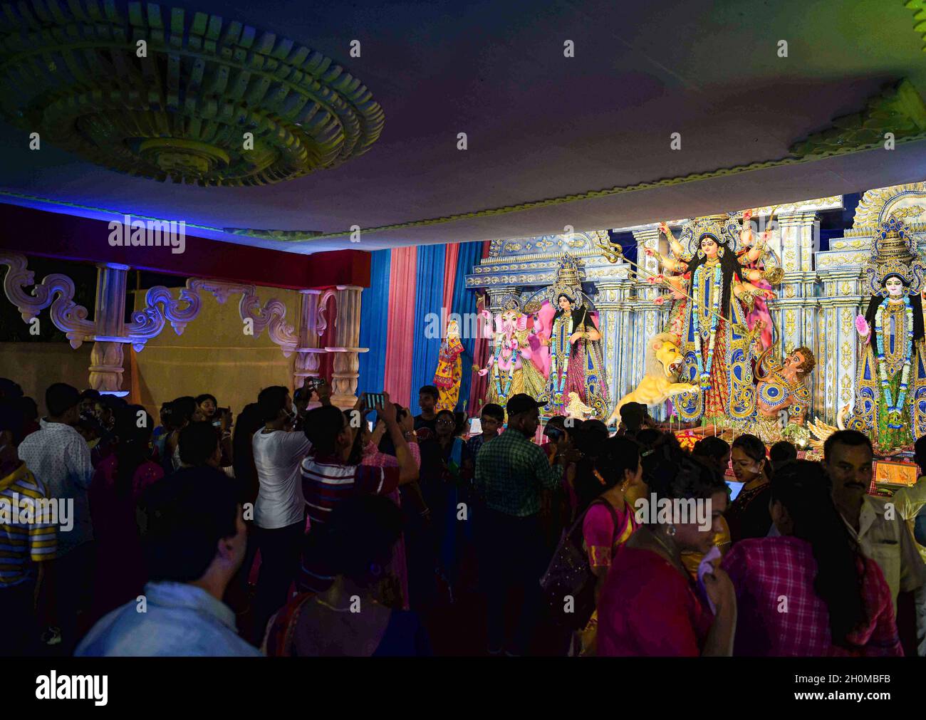 Agartala, Tripura, India. 13-10-2021. People visit a makeshift place of ...