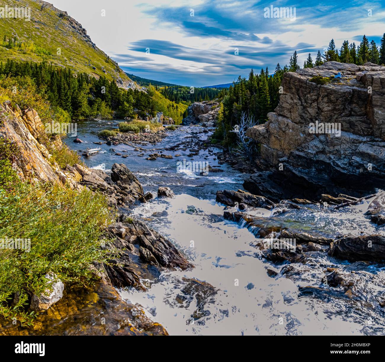 Swiftcurrent Falls Flowing Down Swiftcurrent Creek, Glacier National ...