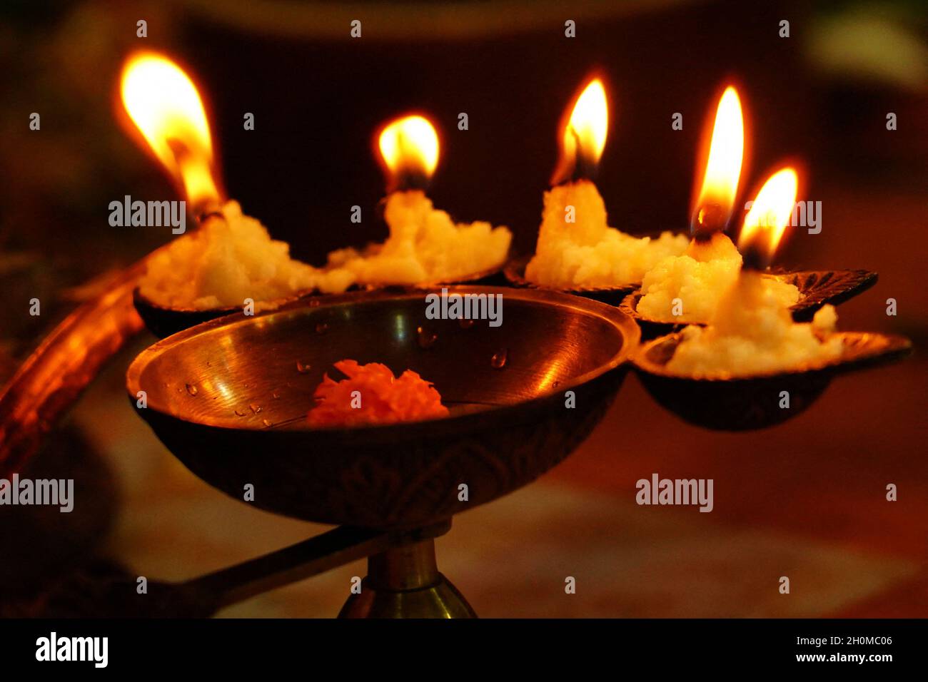 Indian People Perform Rituals in front of an idol of the Goddess Durga ...