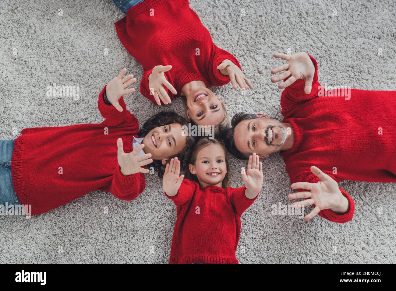 Top above high angle view of beautiful handsome cheerful family lying ...