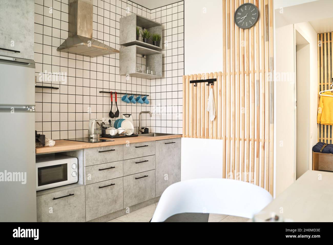 Modern kitchen landscape. Home interior. Light counter Stock Photo - Alamy