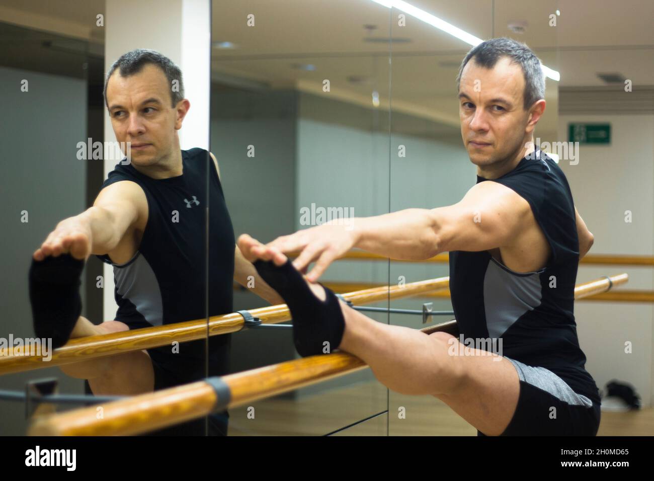 Pilates and ballet fitness stretching and yoga studio gym bar equipment ...