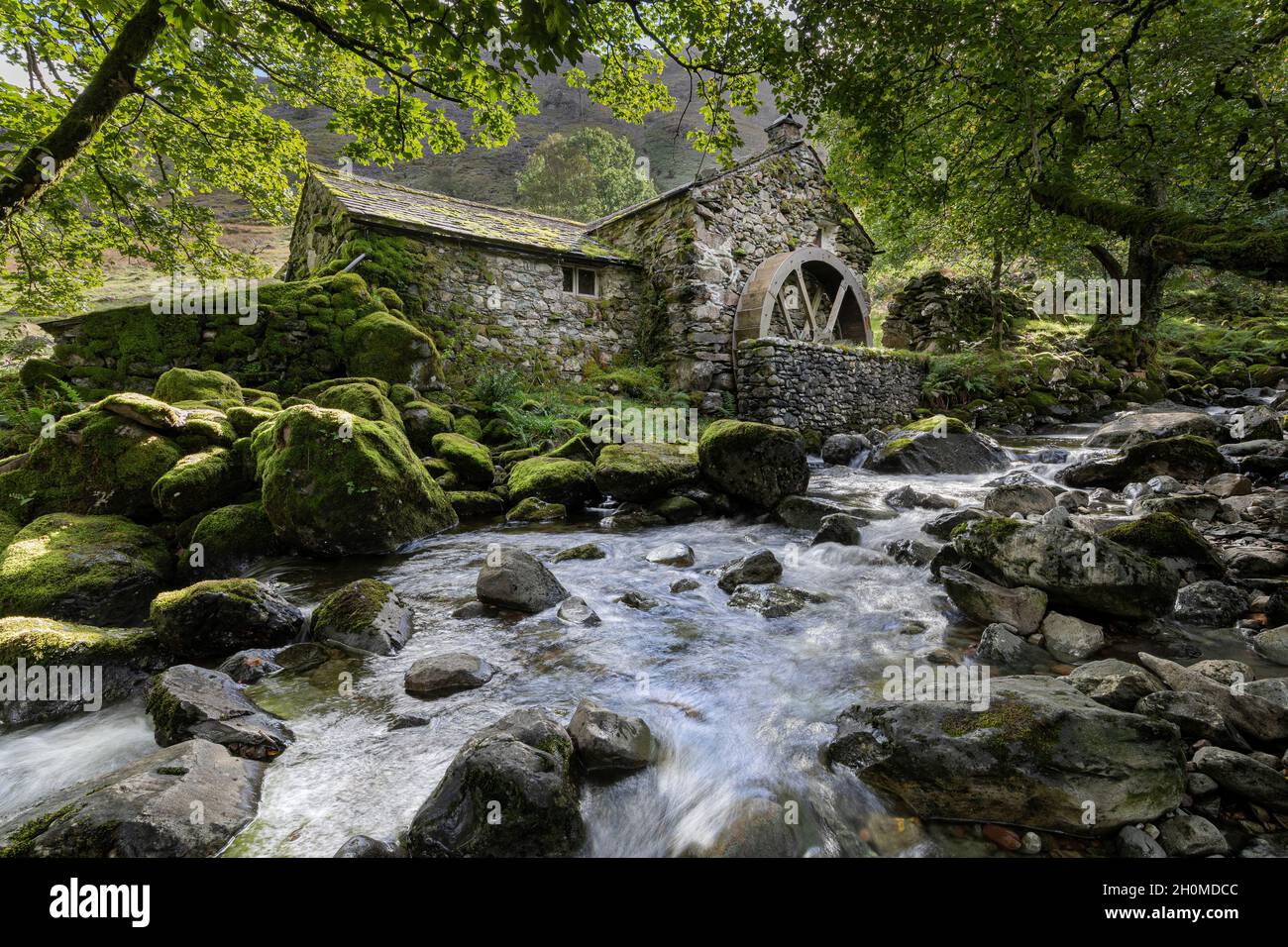 secluded water mill on combe gill in borrowdale lake district Stock ...