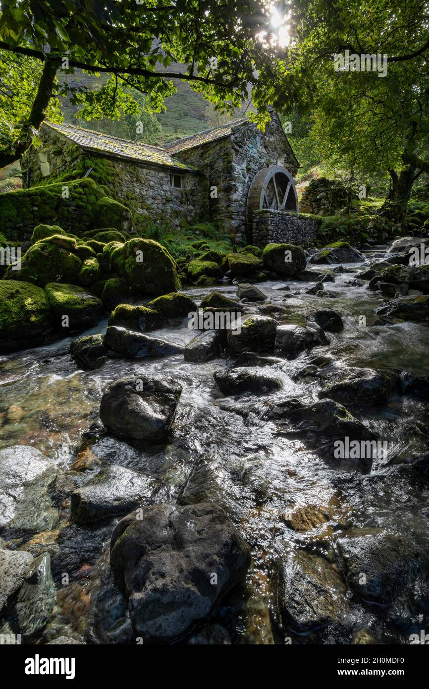 secluded water mill on combe gill in borrowdale lake district vertical ...