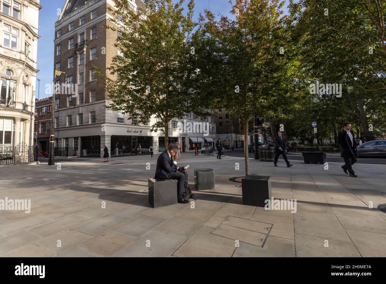 Businessmen return to the Berkeley Square in the heart of Mayfair and ...