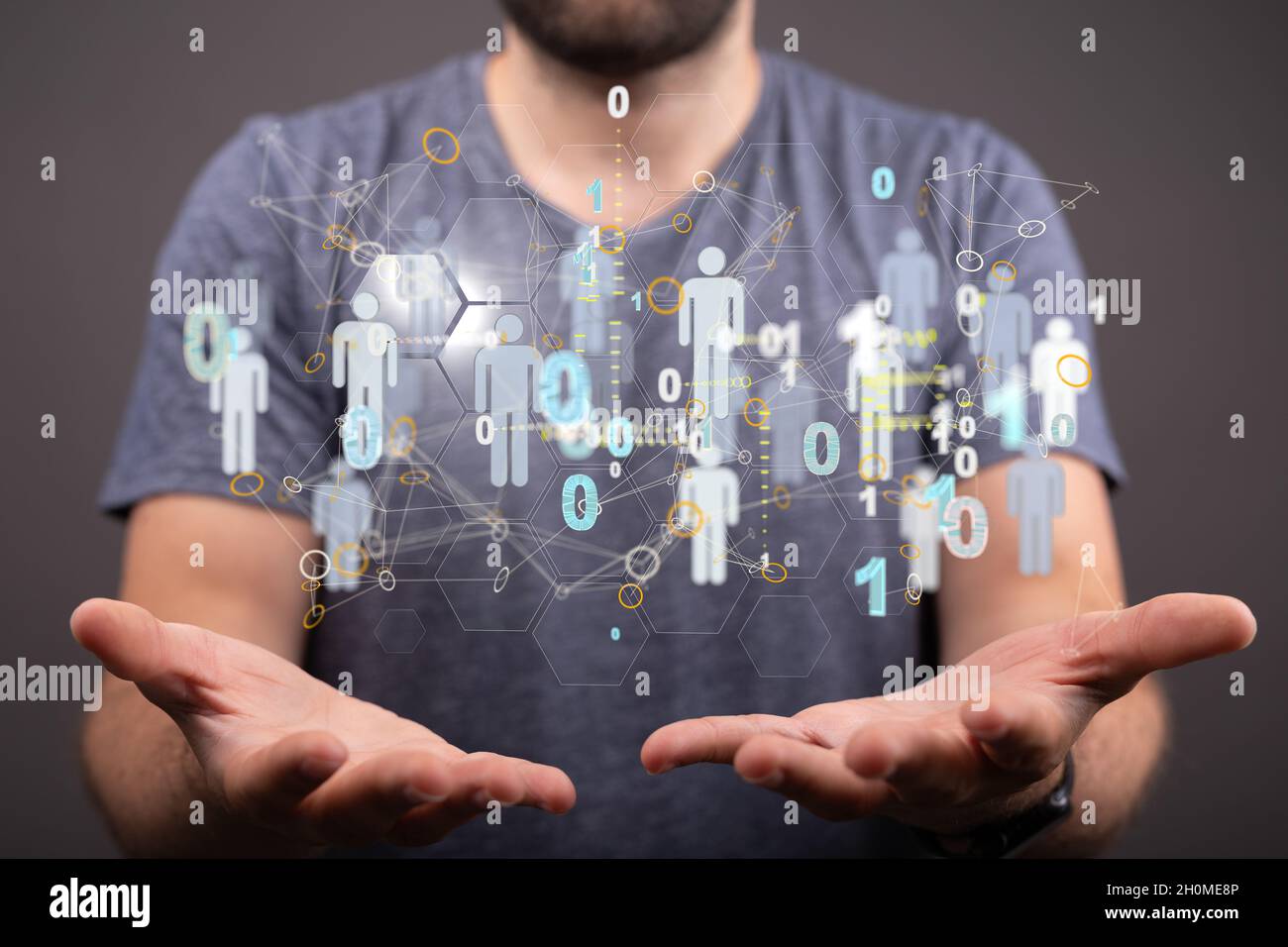 Hand holding 2d icons Stock Photo - Alamy