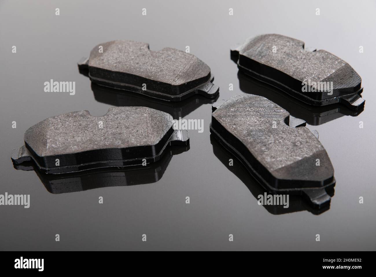 modern safe car brake pads on stylish background Stock Photo - Alamy