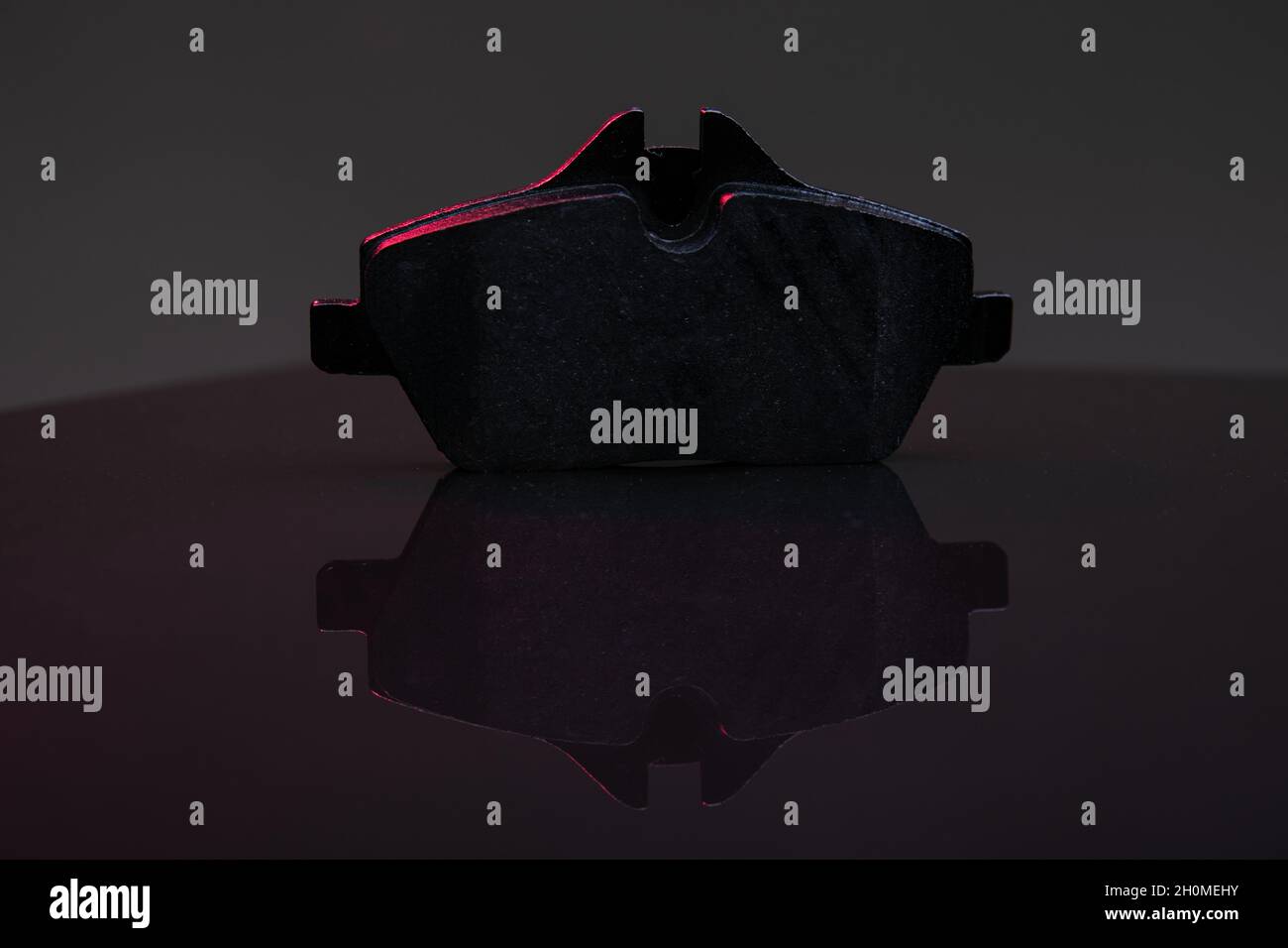 traffic safety, car brake system component, brake pad on dark ...