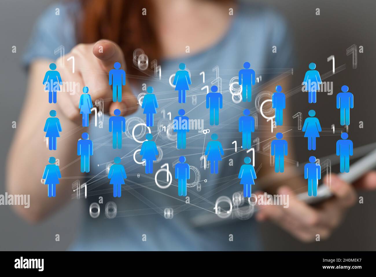 Hand touching 2D icons Stock Photo - Alamy