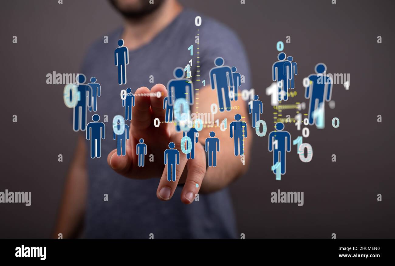 Hand touching 2D icons Stock Photo - Alamy