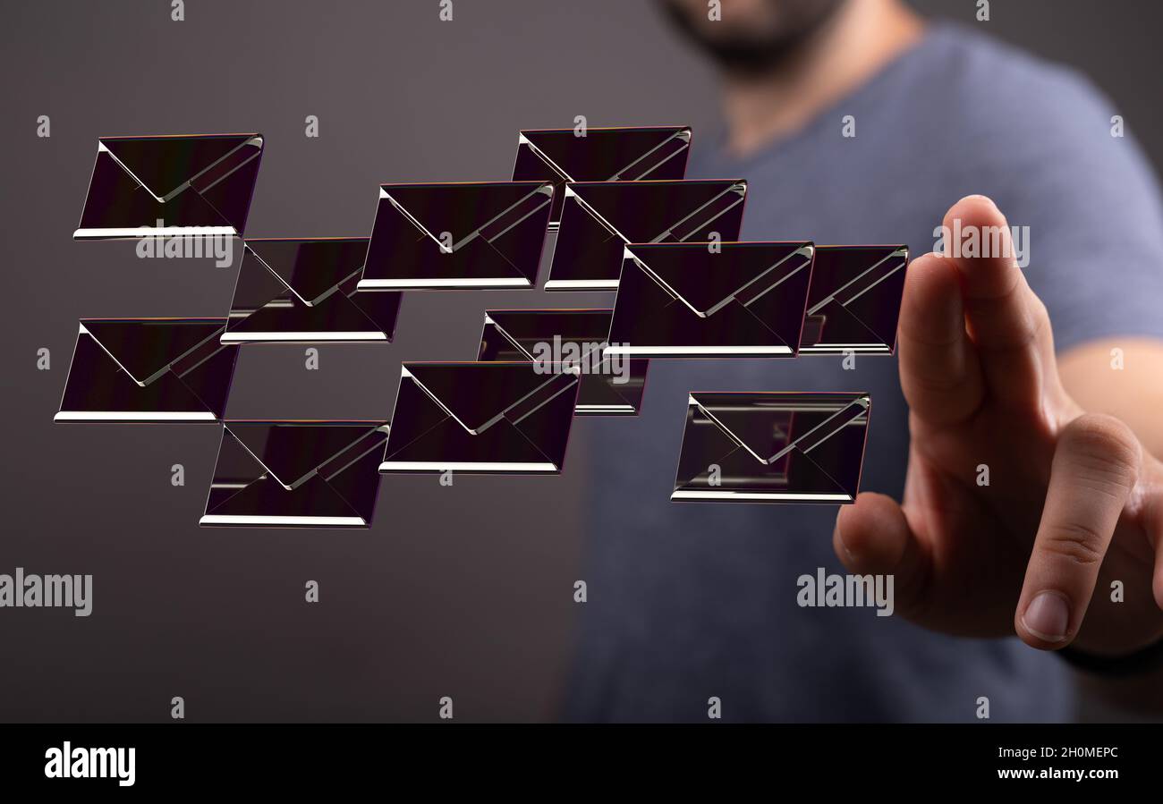 Hands holding 2D mail icons Stock Photo - Alamy