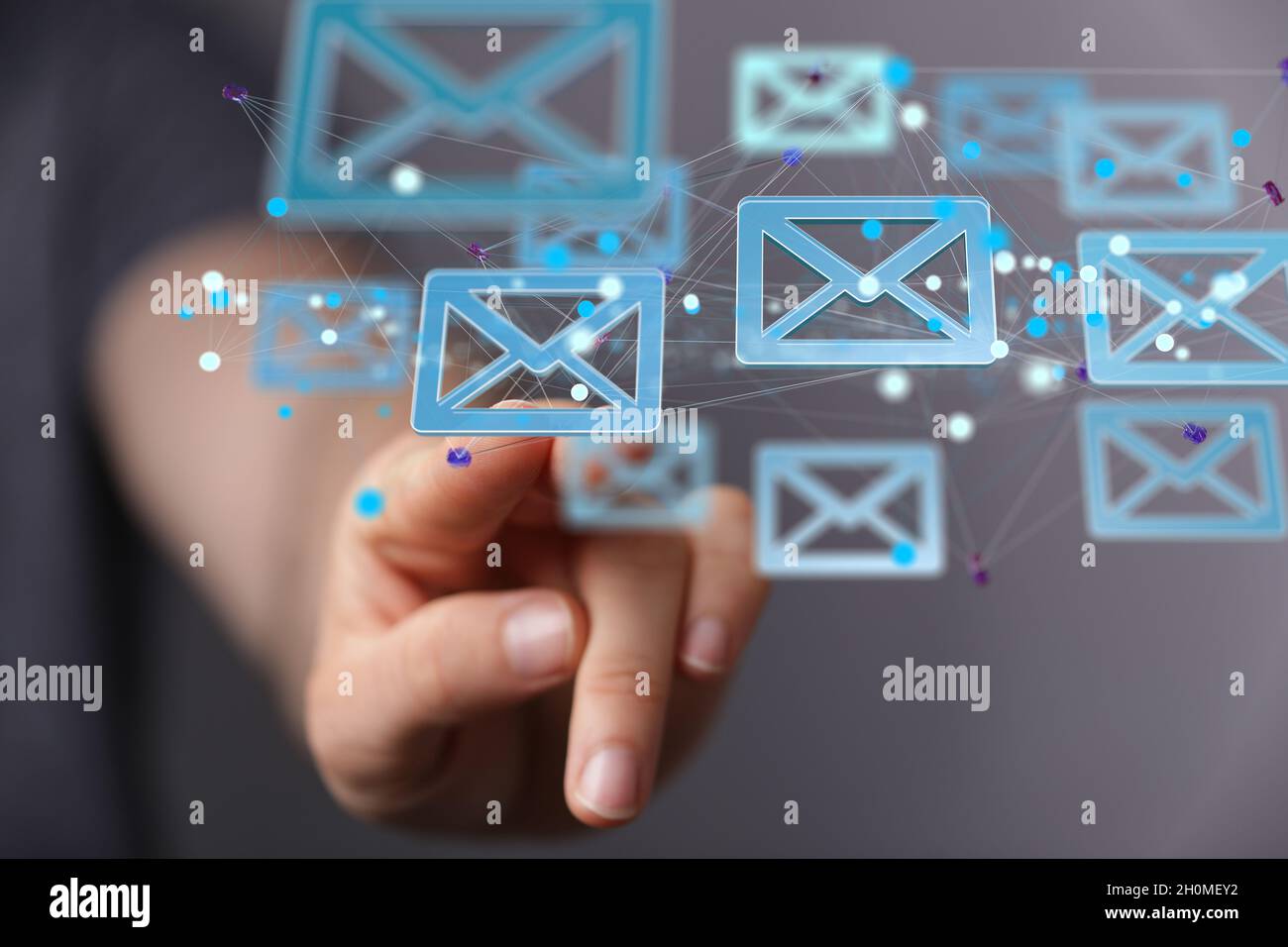 Hand tapping 2D message icons Stock Photo - Alamy